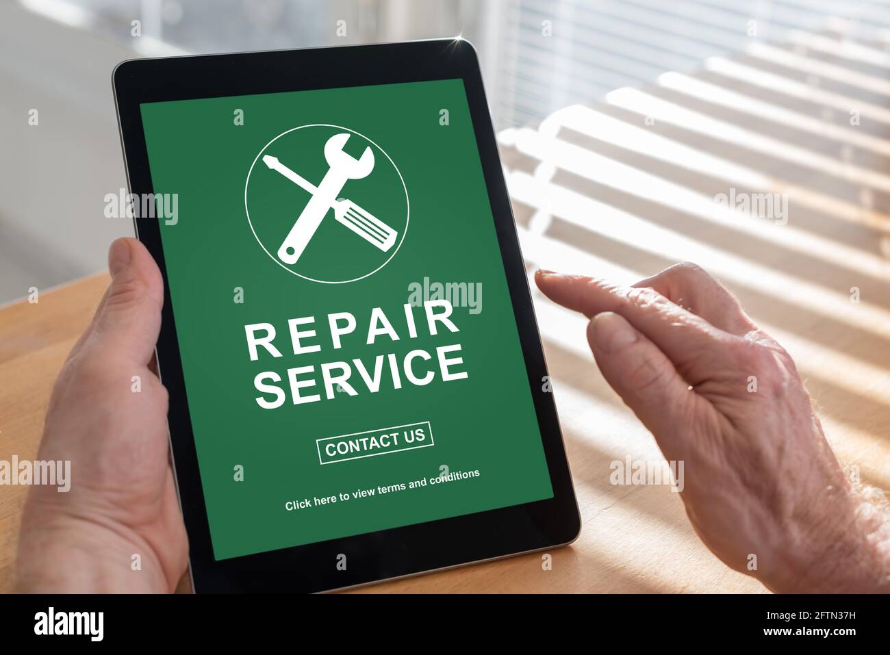 Tablet screen displaying repair hi-res stock photography and images - Alamy