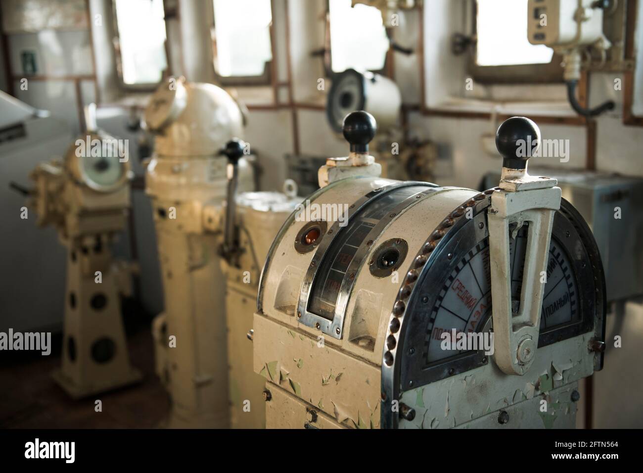 Navigational bridge on abandoned vessel. Old derelict ship wheelhouse ...