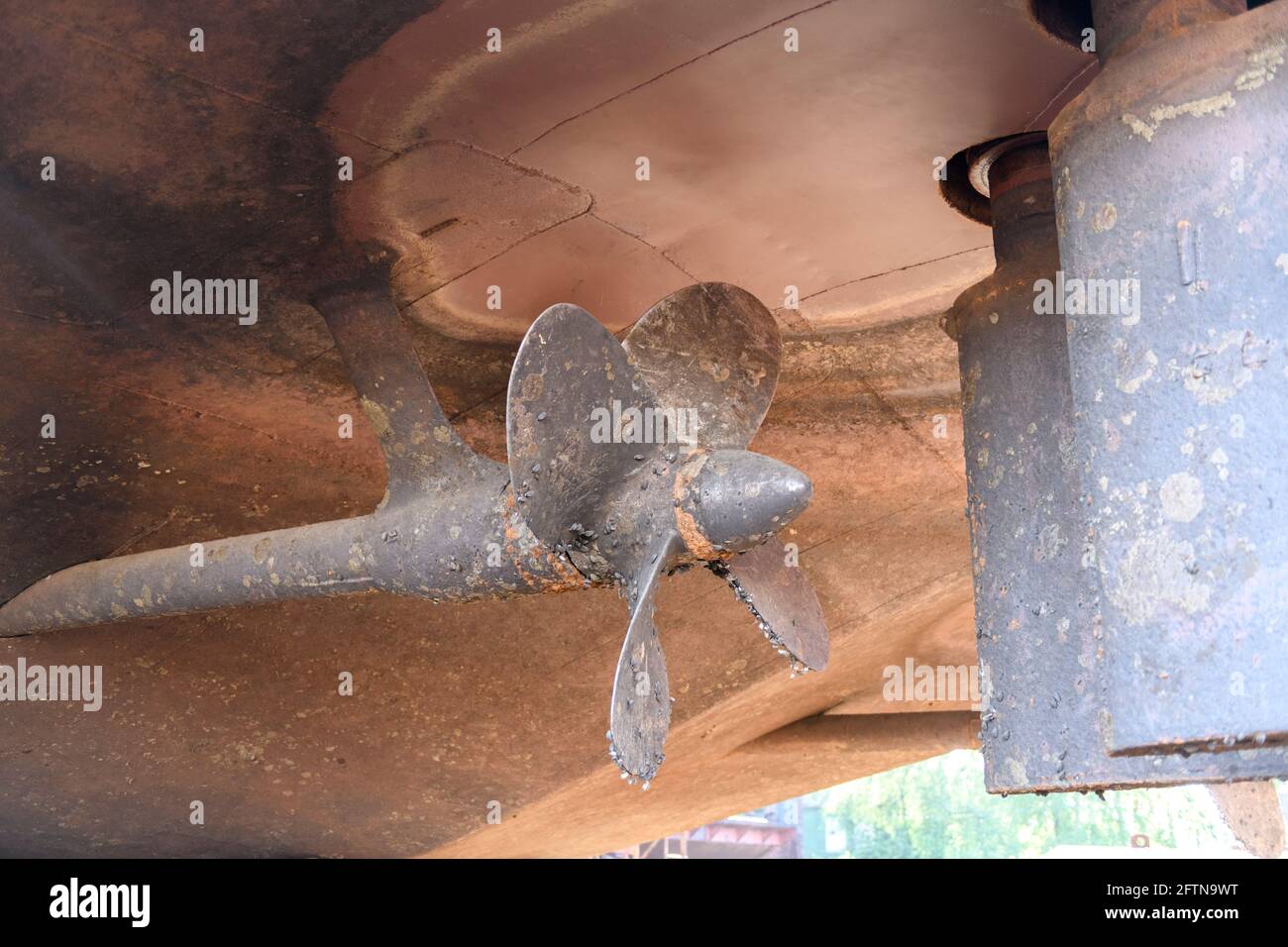Fixed blade propeller and rudder with shells. Cargo vessel ashore on ...
