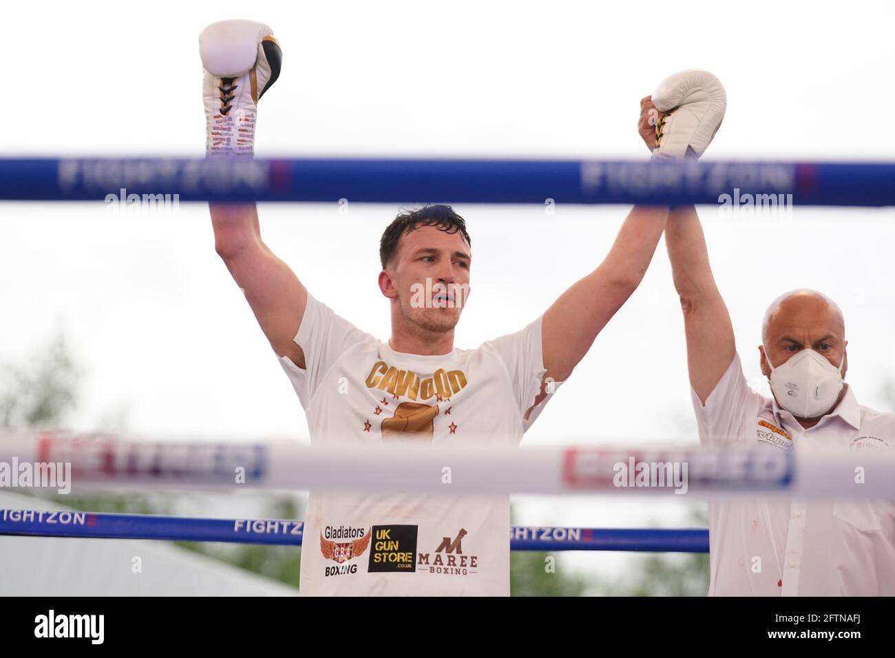 Nathan Cawood celebrates beating Kearon Thomas during their Super ...