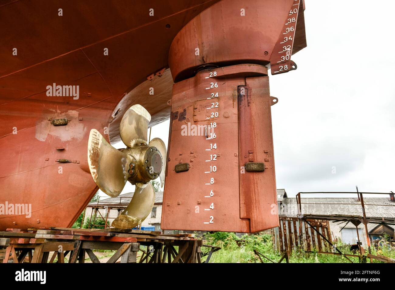 Variable pitch propeller and rudder. Cargo vessel ashore on ship ...
