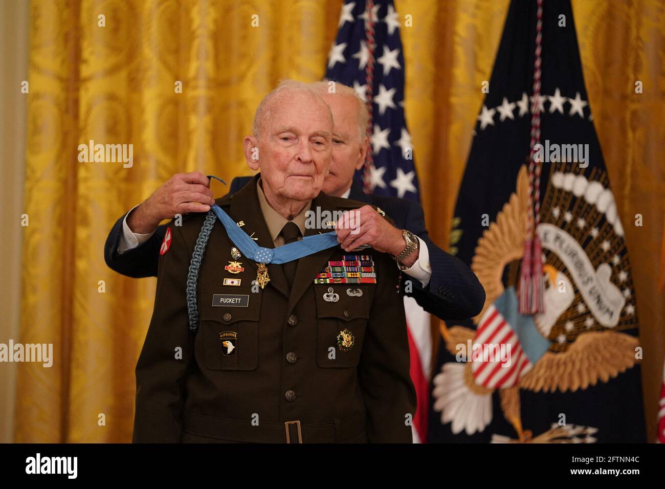 U.S. President Joe Biden speaks during an East Room ceremony prior to ...