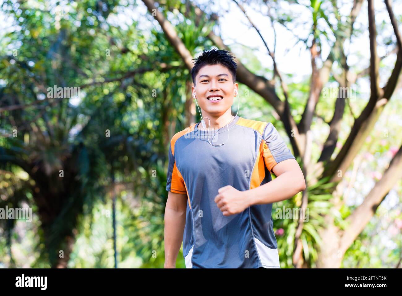 Healthy asian man runner in hi-res stock photography and images - Alamy