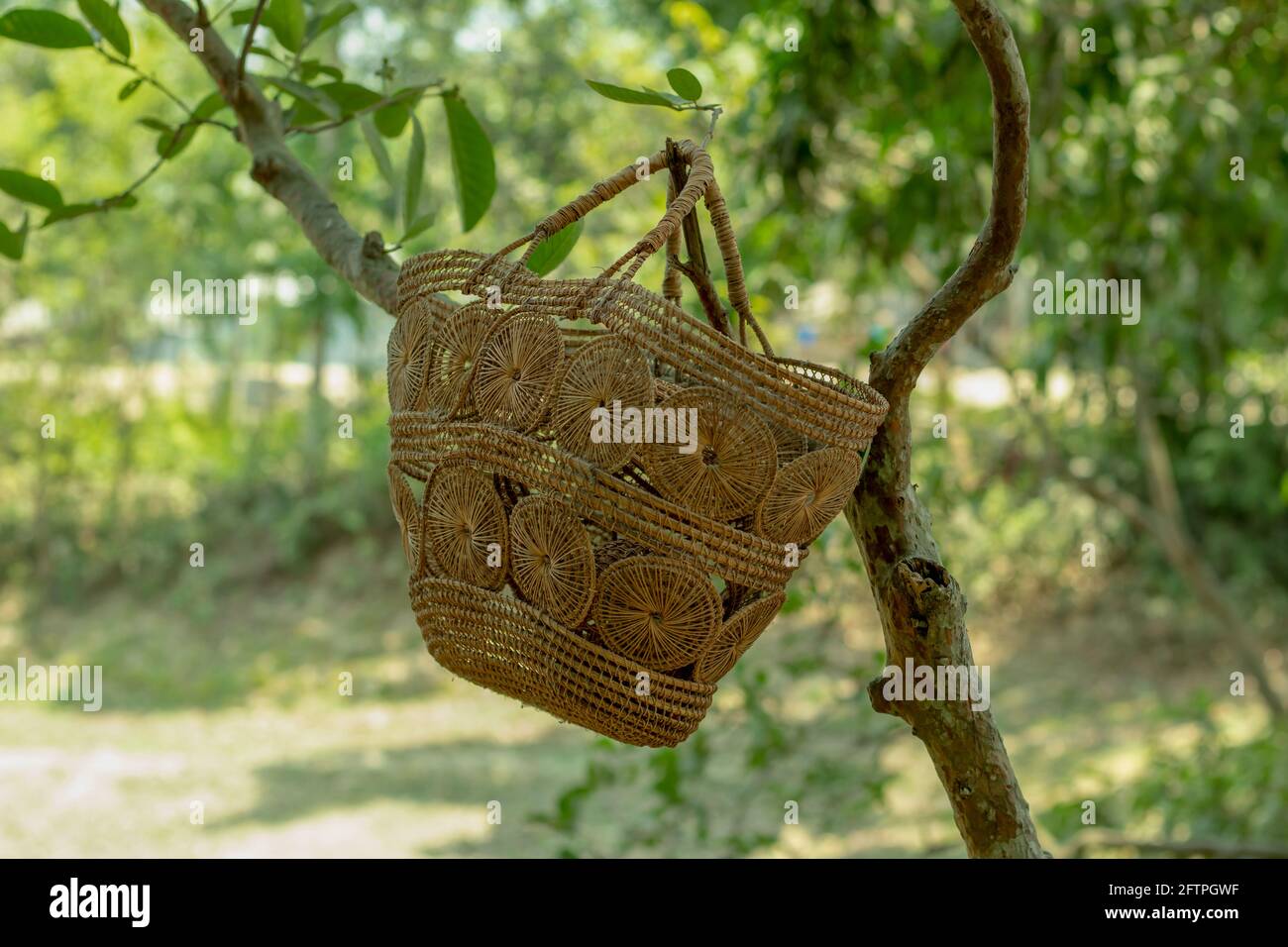 A handicraft or small decorated beautiful basket made of bamboo cane ...
