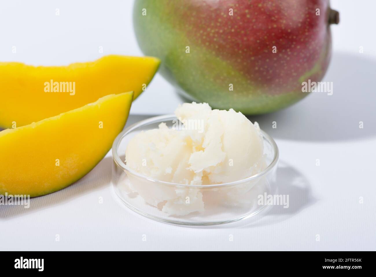 Mango butter and fresh mango fruit. Organic cosmetic, skin care, spa ...