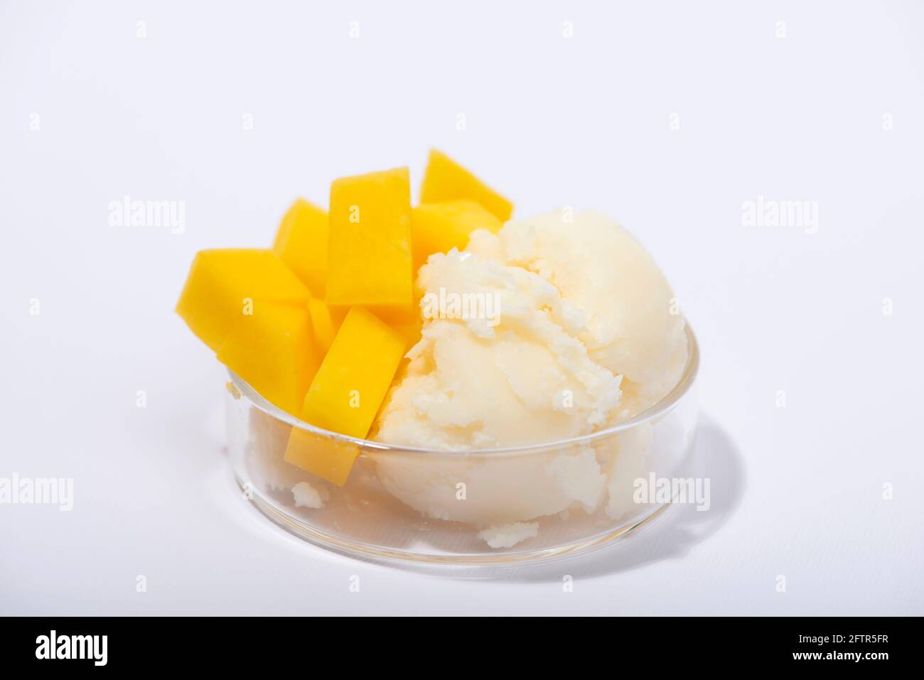 Mango butter and fresh mango fruit. Organic cosmetic, skin care, spa ...