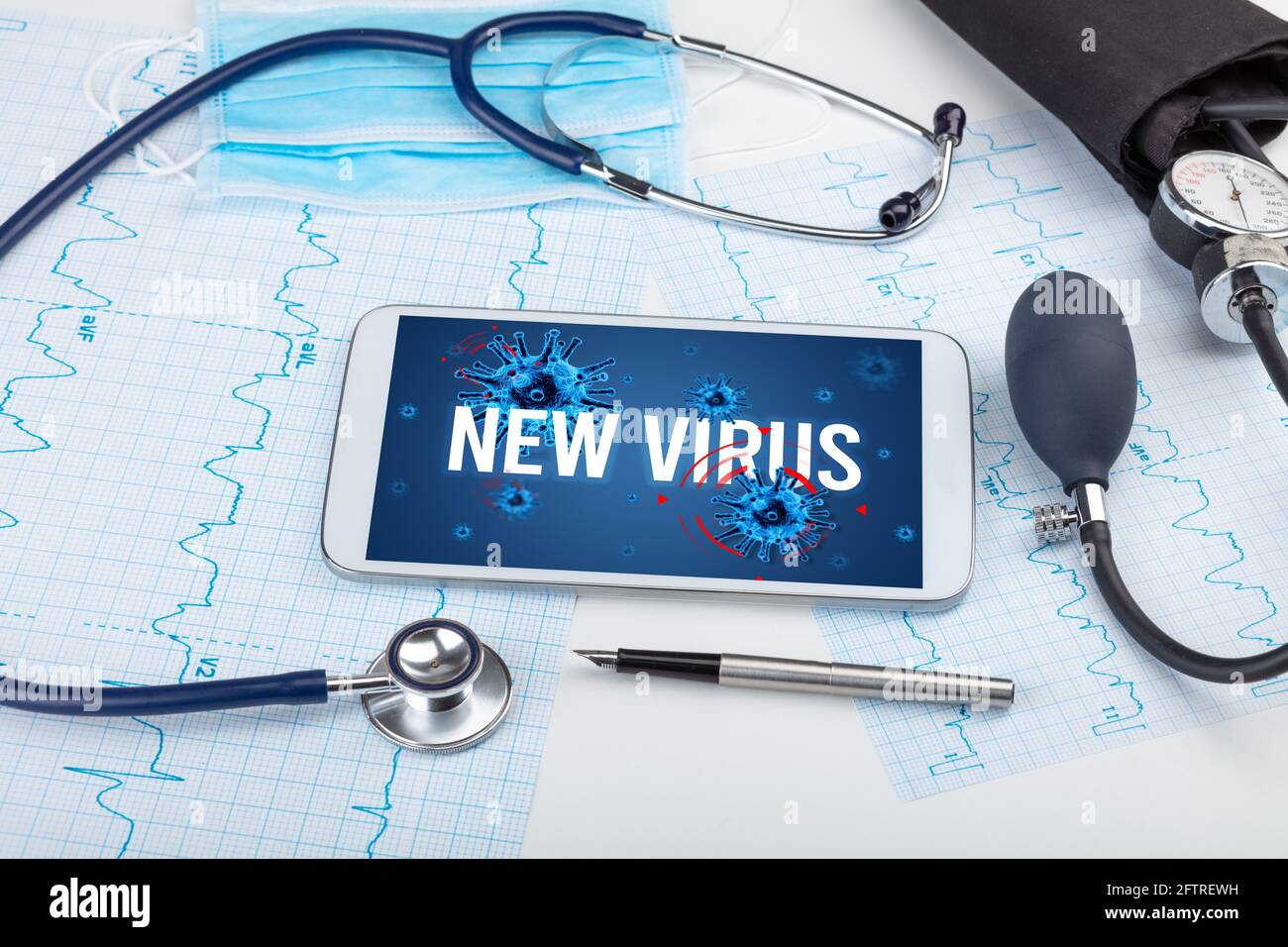 Tablet pc and doctor tools on white surface Stock Photo - Alamy