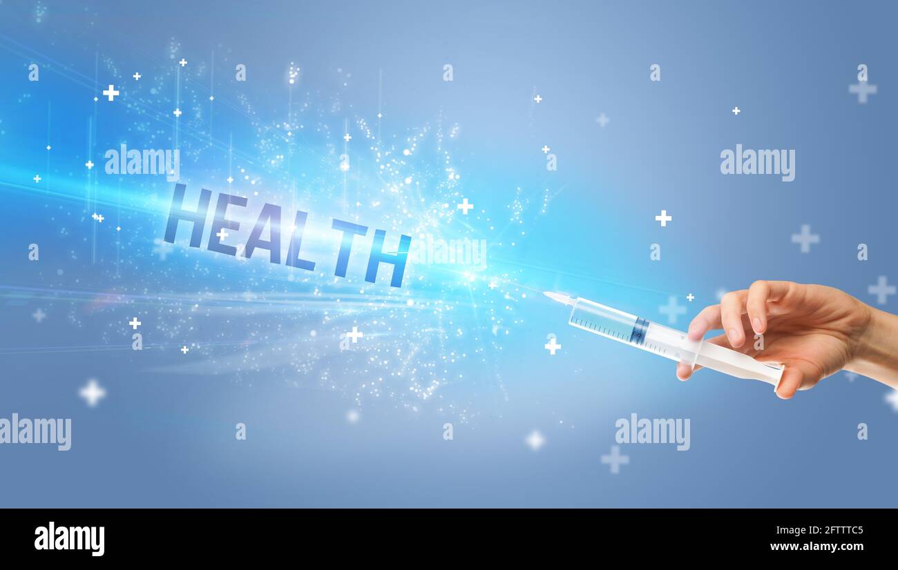 Syringe, medical injection in hand Stock Photo - Alamy