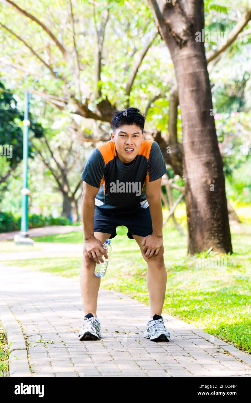 Out of breath asian hi-res stock photography and images - Alamy