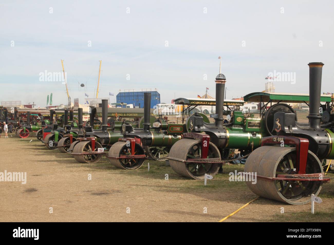a long row with historical steam tractors at the fields at the great ...