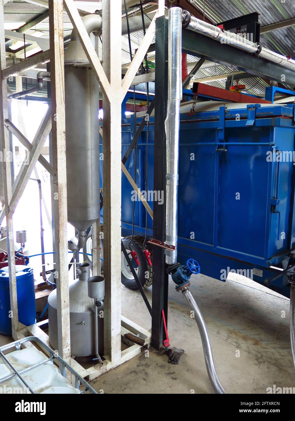 Lavender steam distilling in specialist trailer Stock Photo - Alamy