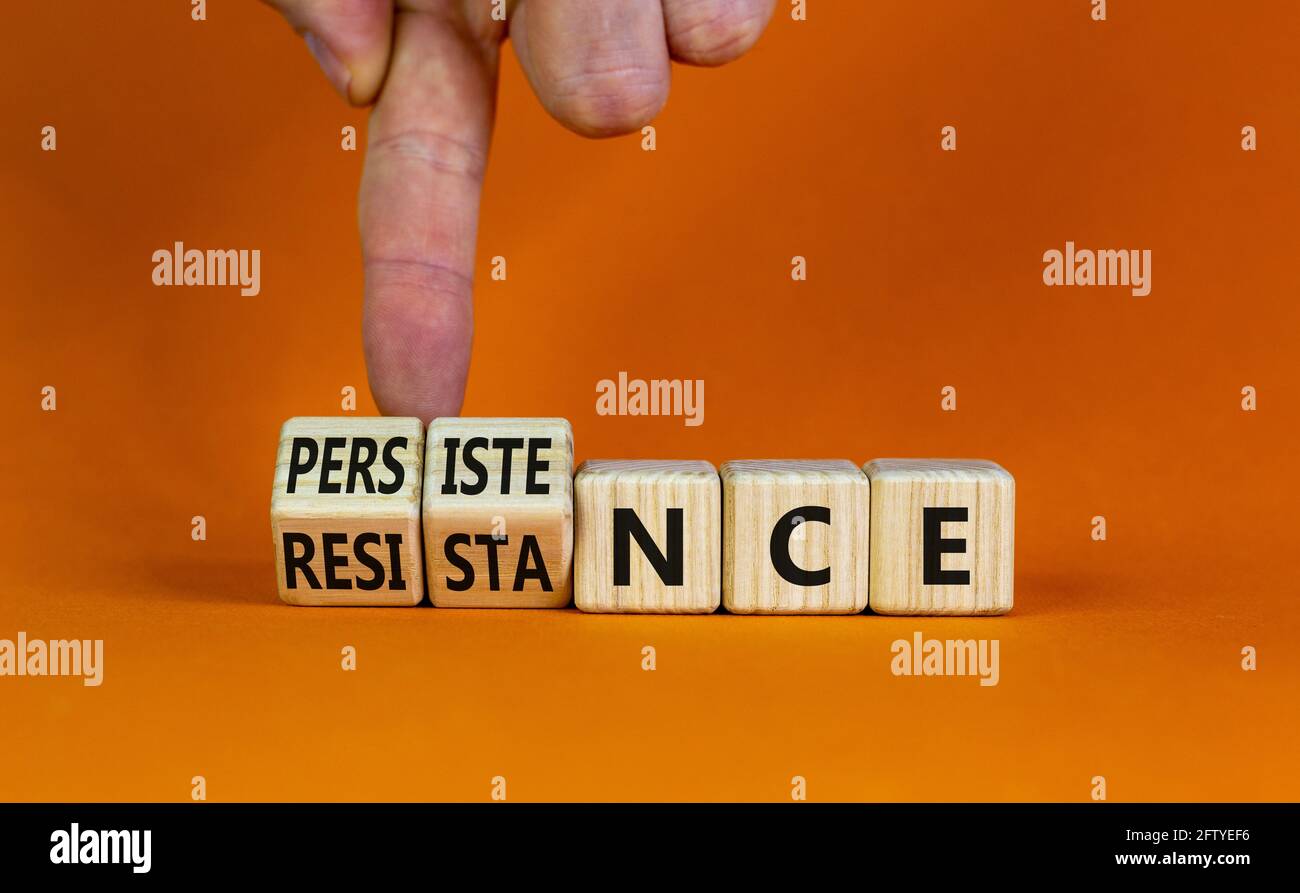 Persistence or resistance symbol. Businessman turns cubes, changes the ...