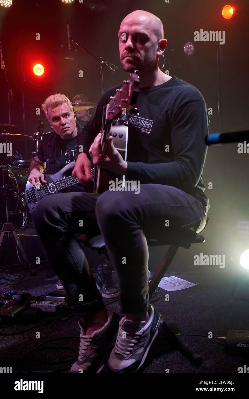 Ivan Kilar and Vitaly Demidenko of Louna Rock band perform on stage ...