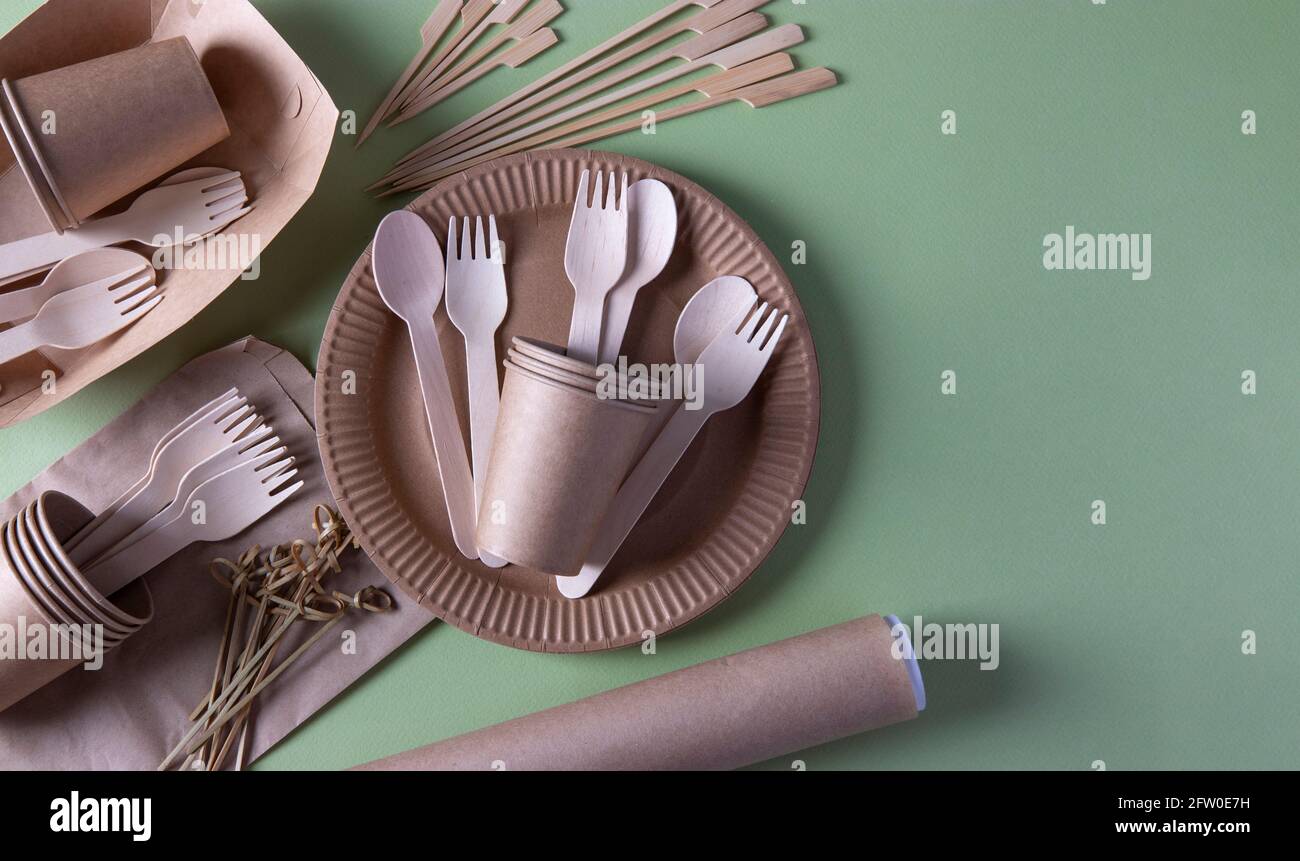 Disposable biodegradable tableware on craft paper plates - forks ...