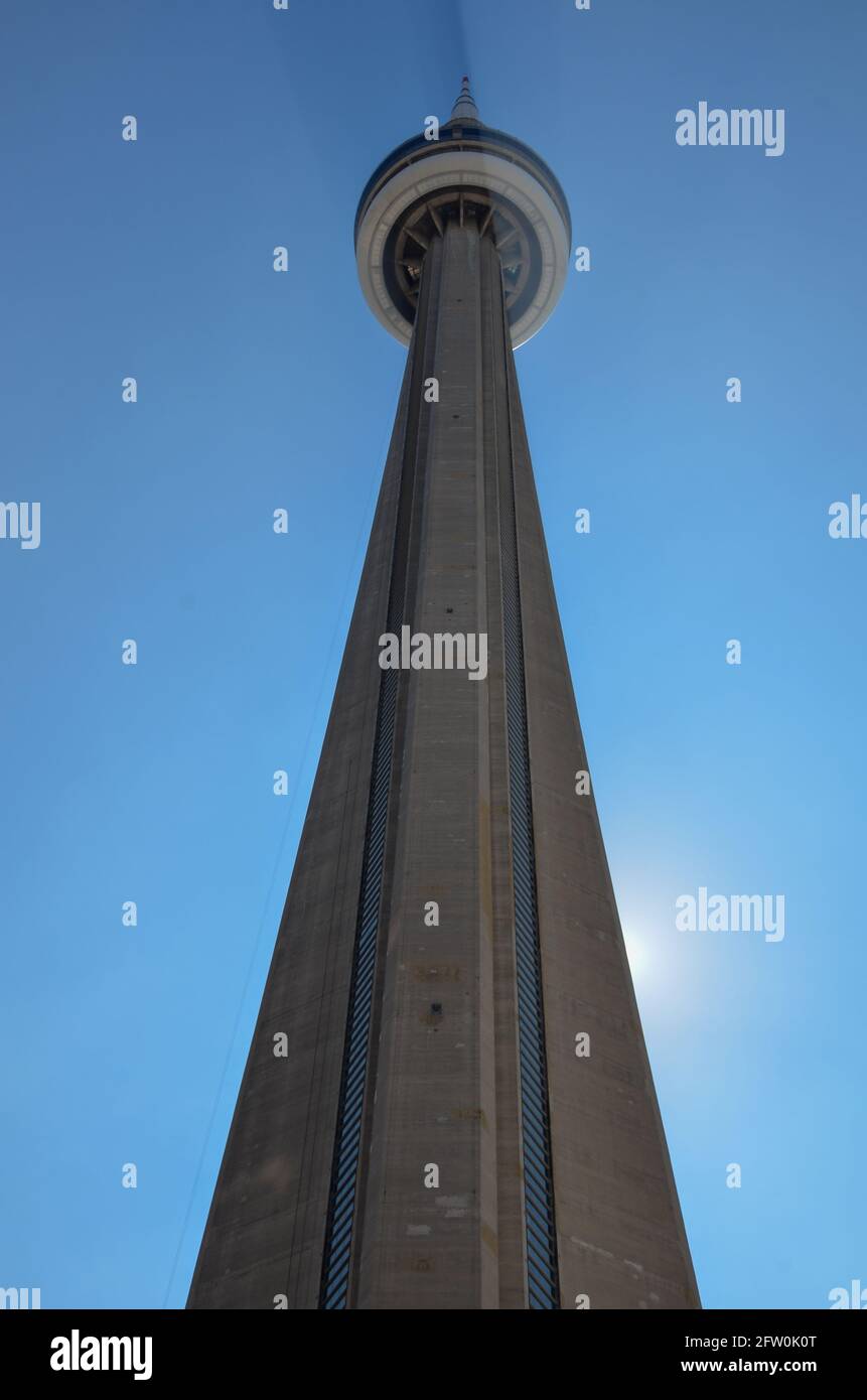 Toronto, Canada - July 14 2013: CN Tower under a sunny blue sky with ...