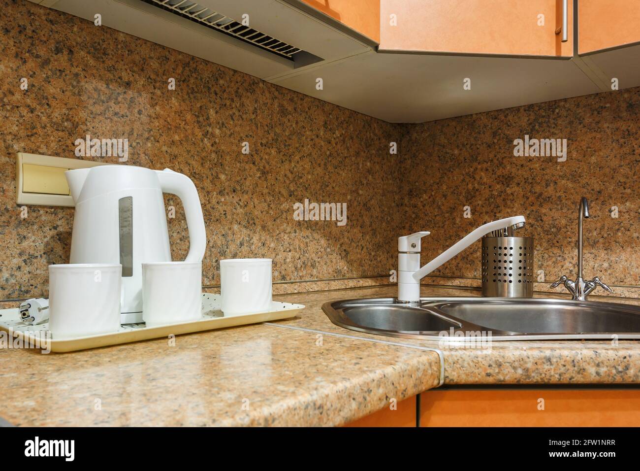 Water tap sink with faucet in expensive kitchen Stock Photo - Alamy