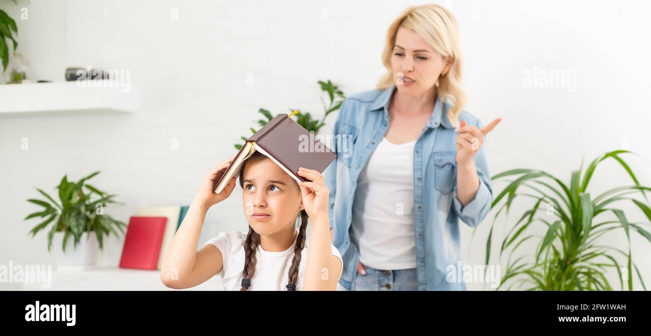 mother daughter study together at home Stock Photo - Alamy