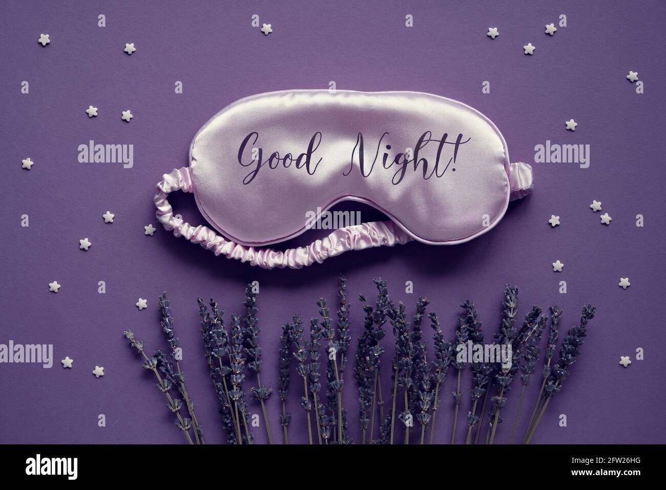 Sleep mask with lavender on dark grey background with black clouds ...