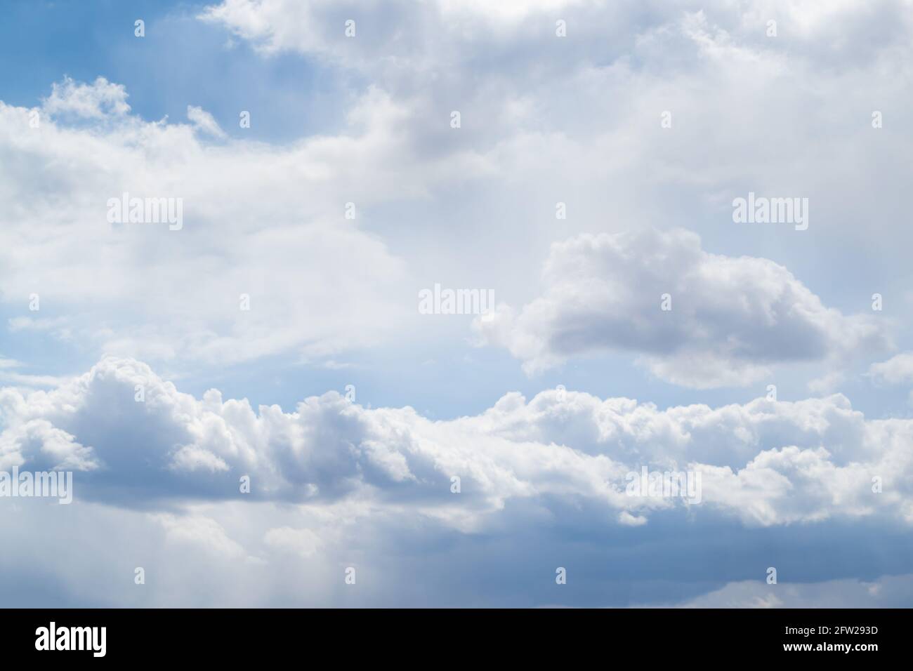 Blue sky with beautiful cumulus clouds, background Stock Photo - Alamy