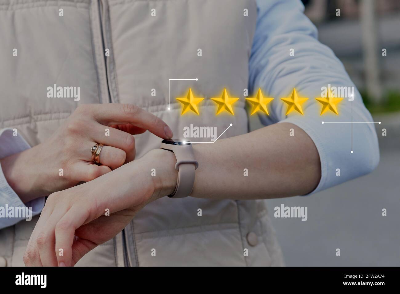 Five star rating concept. The person uses a smart watch Stock Photo - Alamy