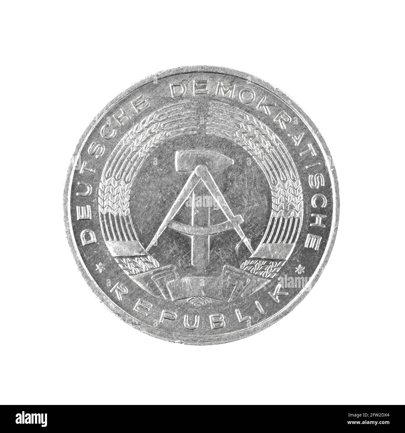 Back side of ten 10 penning coin East German money isolated on a white ...