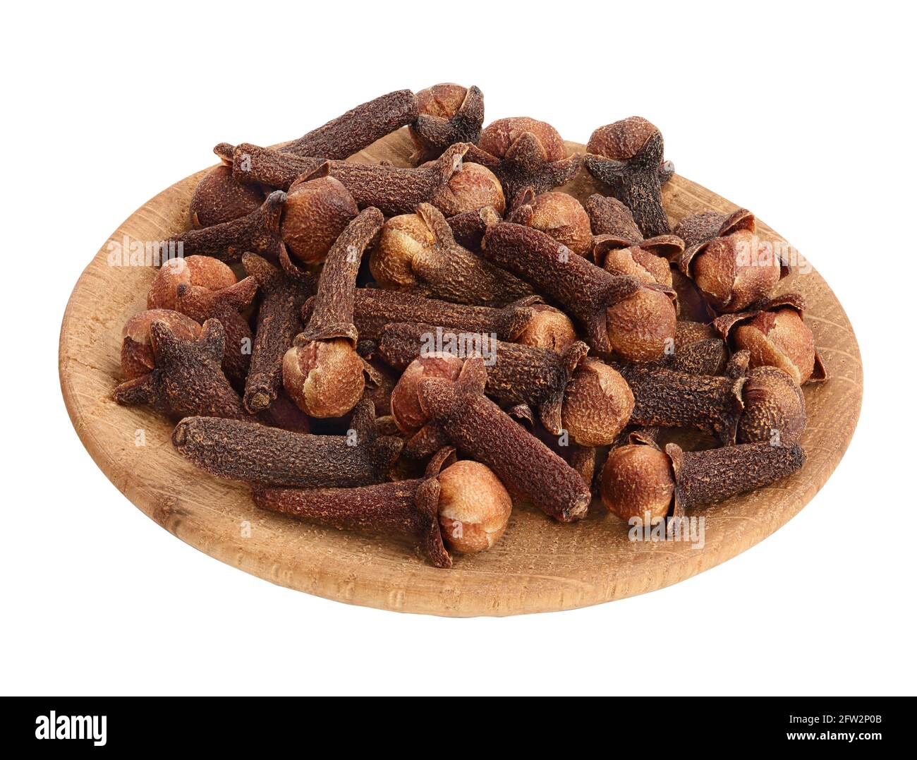 Dry spice cloves in wooden bowl isolated on white background with ...