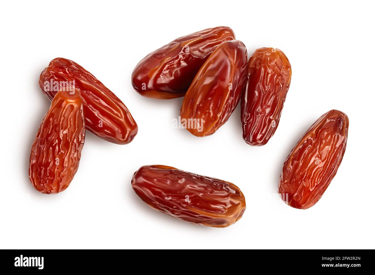 Dates isolated on white background with clipping path. Top view. Flat ...