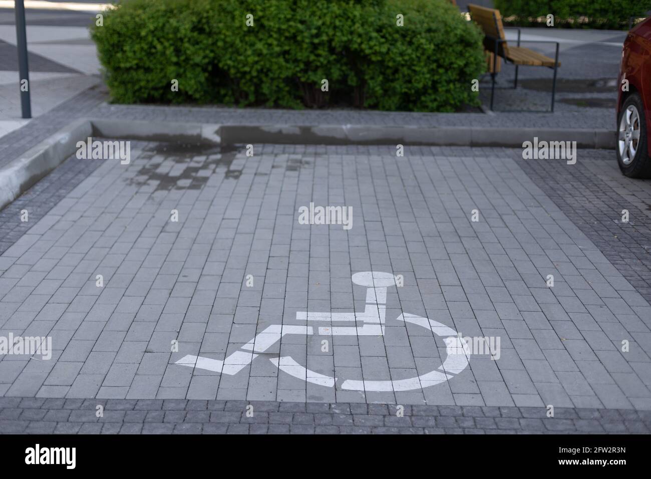 Cars parking with disability sign Stock Photo - Alamy