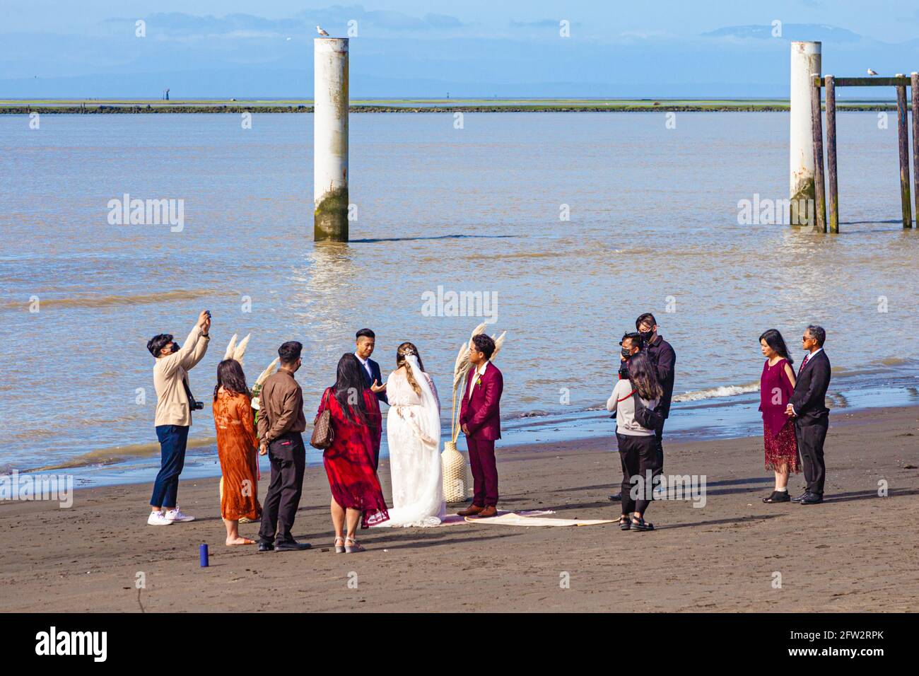 A small beach wedding at Gary Point Park during the Covid pandemic ...