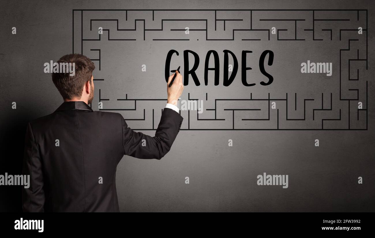 businessman drawing maze concept Stock Photo - Alamy