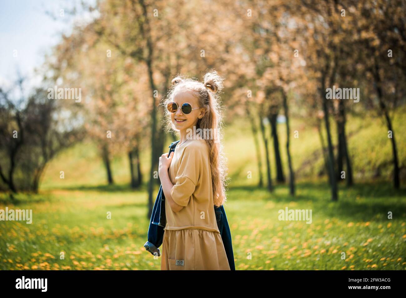 Cute little girl in the park on a sunny summer day, Outdoor summer ...