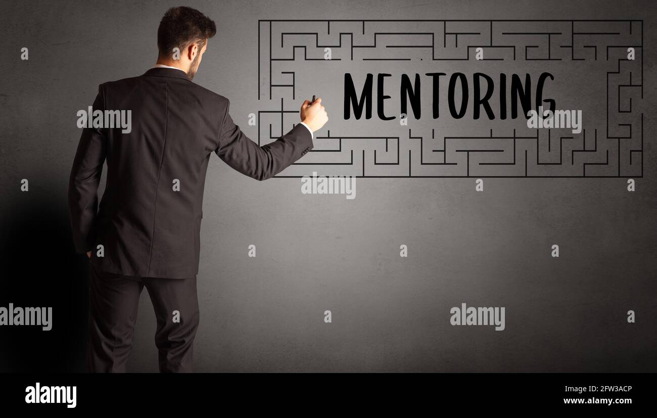 businessman drawing maze concept Stock Photo - Alamy