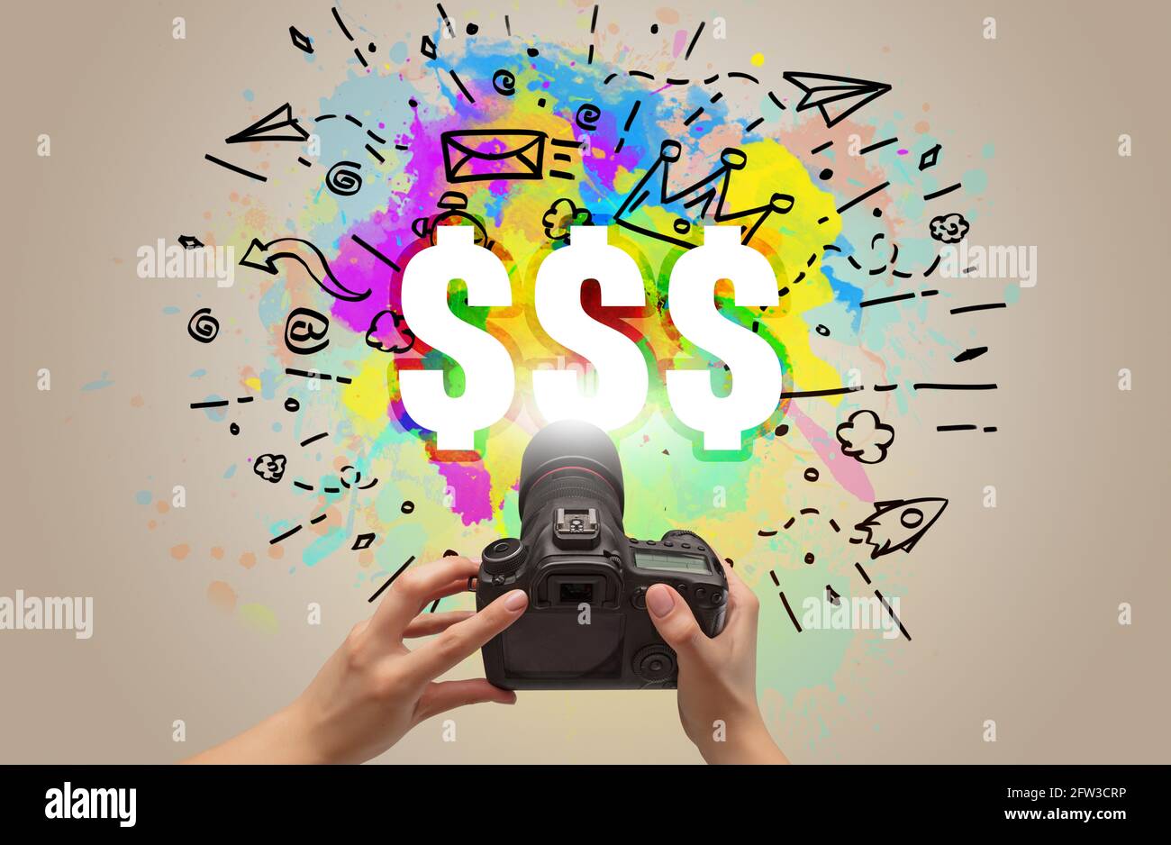 Close-up of a hand holding digital camera with abstract drawing concept ...