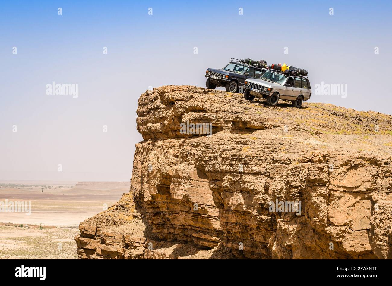 Erfoud, Morocco - April 15, 2015. Two vintage off road cars parked on ...