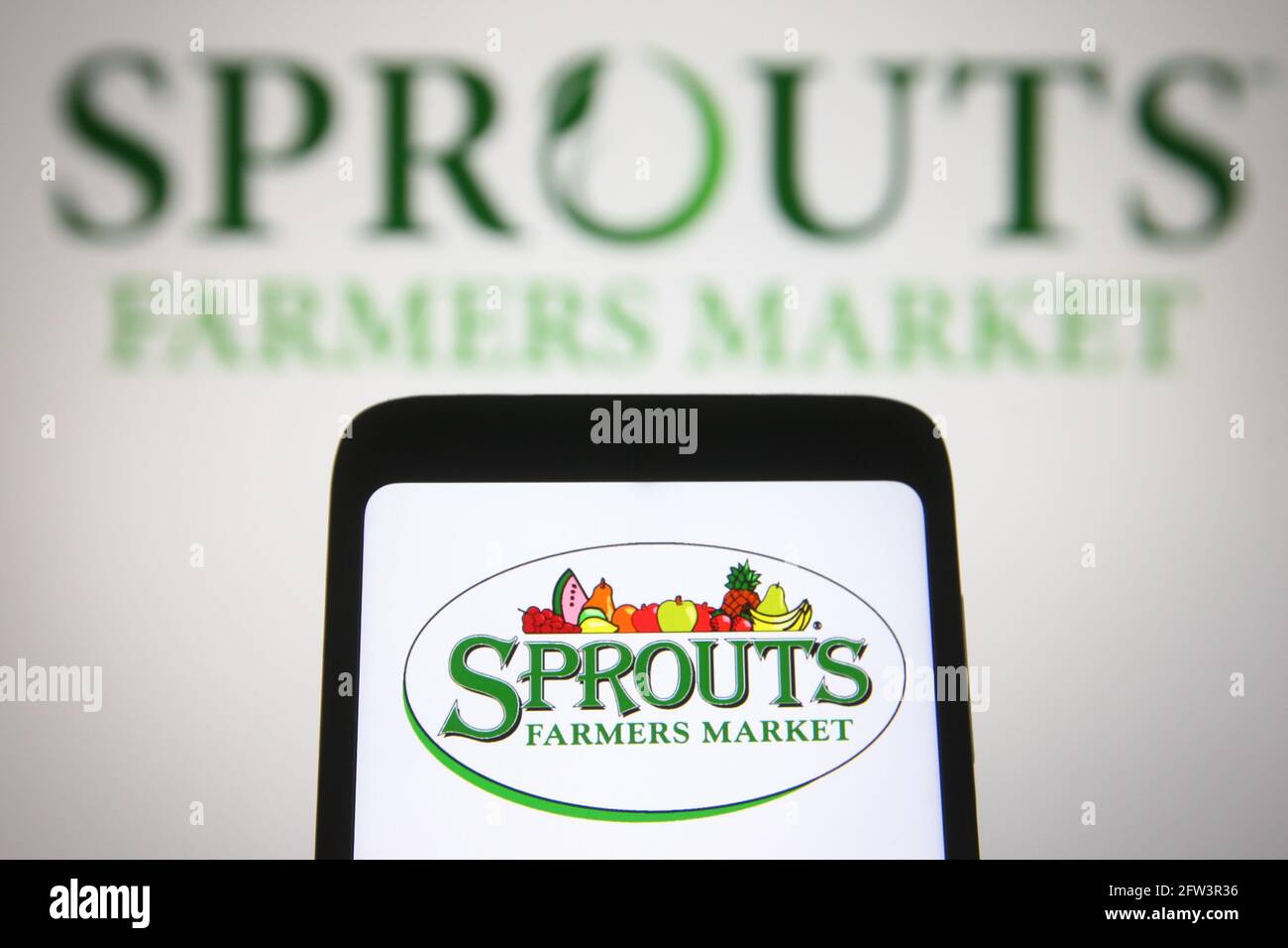 In this photo illustration the Sprouts Farmers Market logo of a ...