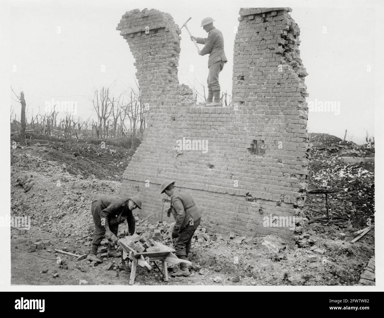 World War One, WWI, Western Front - Men removing bricks from the ruins ...