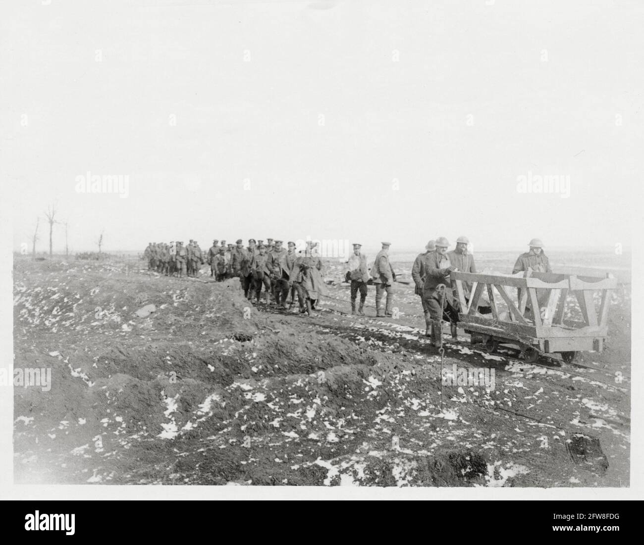 World War One, WWI, Western Front - Troops coming in along a light ...