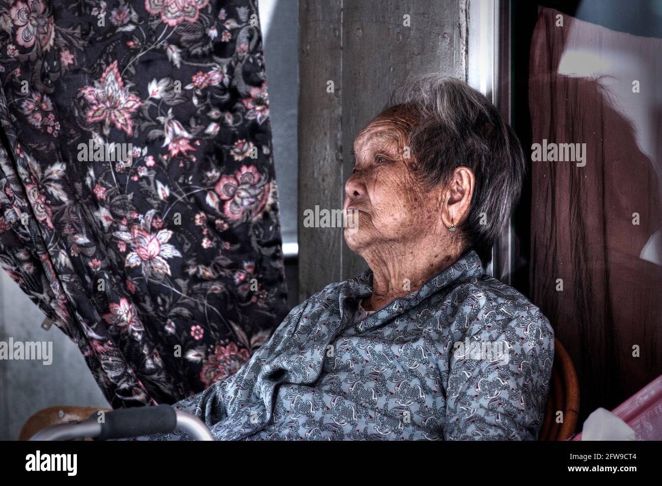 HONG KONG - April 10, 2011: Portrait an elderly Tanka woman in deep ...