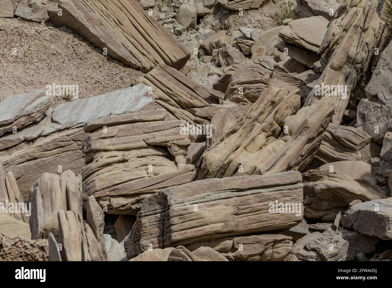 Sandstone formations atop solfter clay in Toadstool Geologic Park ...