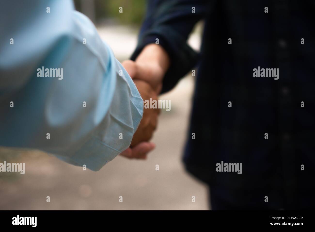 Friends shake hand teamwork partnership , Hand shake concept Stock ...
