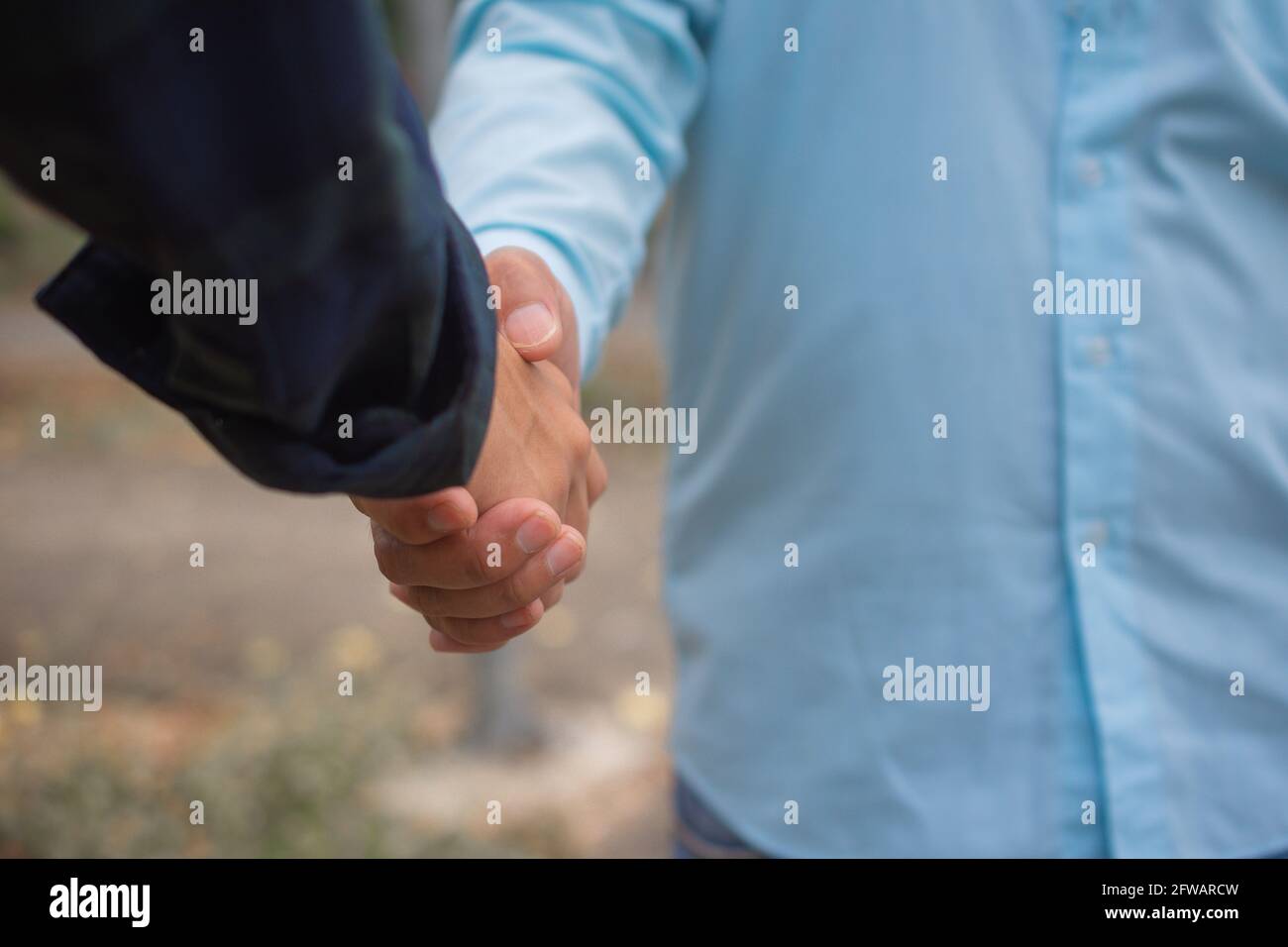 Friends shake hand teamwork partnership , Hand shake concept Stock ...