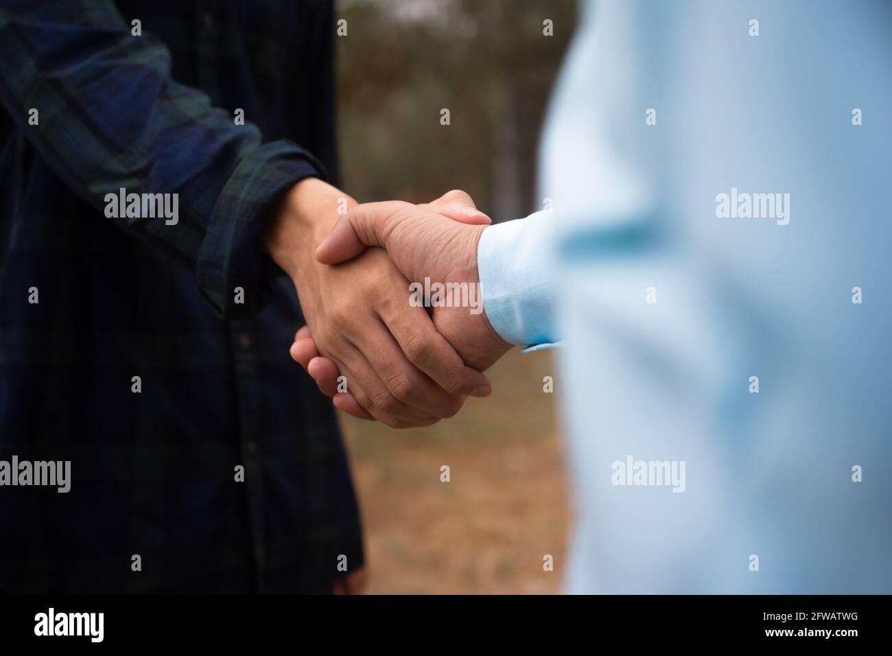 Friends shake hand teamwork partnership , Hand shake concept Stock ...