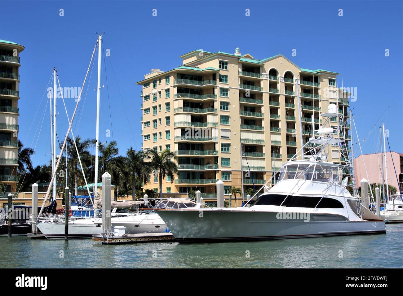 Yachts and sailboats in a marina in Marco Island, Florida Stock Photo ...