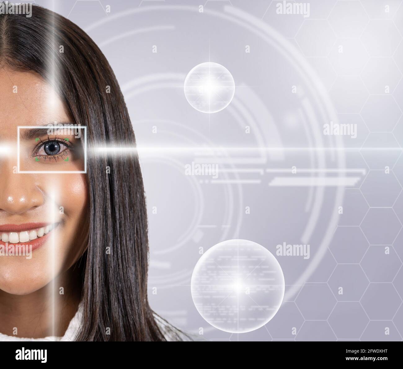 Eye scanning of asian young woman by laser light over the digital ...