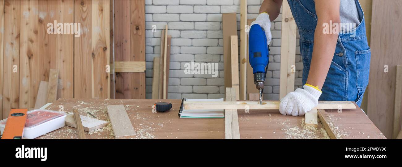 Carpentry drilling the planks as they were prepared at the woodworking ...