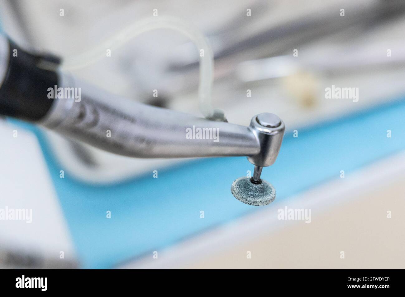 Close-up on dental surgery handpiece burr with round tip for polishing ...
