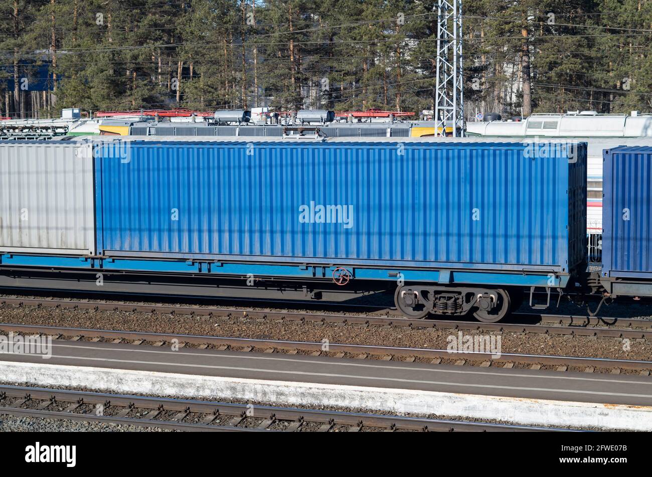 container on a railway platform Stock Photo - Alamy