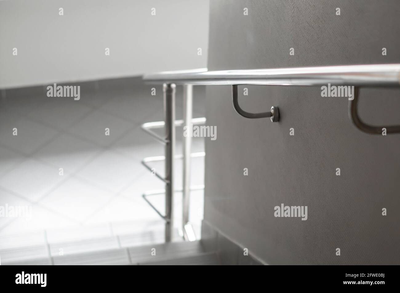 modern chrome handrails on the stairs Stock Photo - Alamy