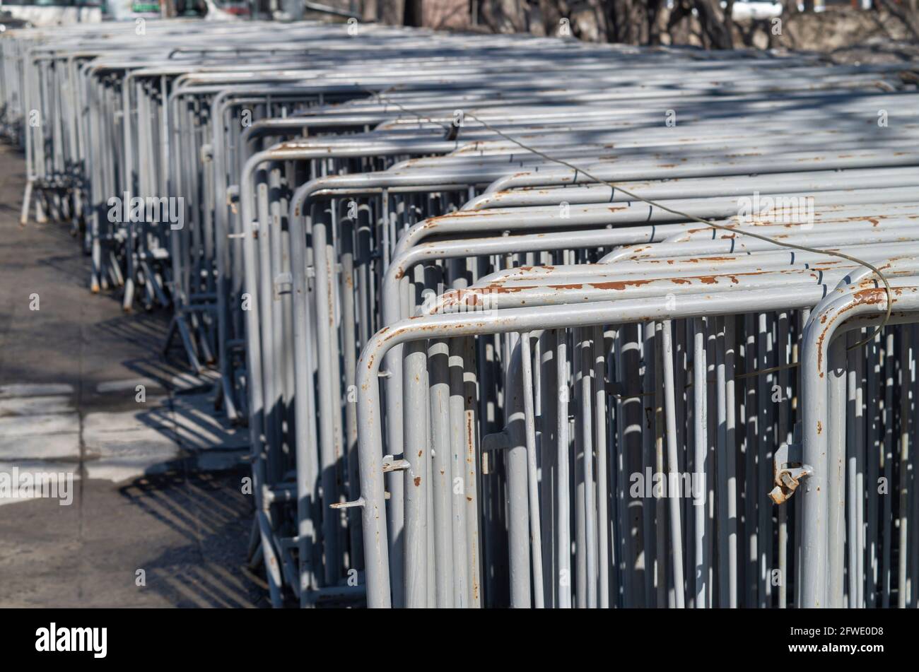 metal modules of mobile street fencing arranged in rows Stock Photo - Alamy