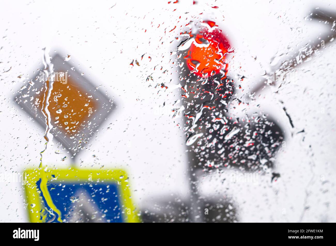 Windshield of a car standing at a traffic light in the rain Stock Photo ...